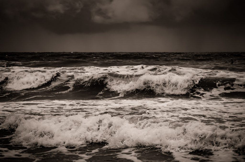Beauty in an Angry Sea - Ron Mayhew